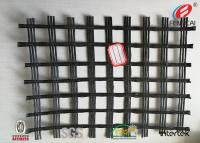 China Durable Polyester Geogrid Reinforcing Fabric 20-1200KN/m Tensile Strength 1-6m Width Black for sale