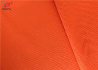 China Orange Reflective Fluorescent Material Fabric Multifunctional Bird Eyes Mesh Fabric for sale
