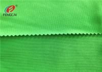 China Waterproof Green Polyester Brushed Tricot Fabric Lining Fabric For Garment for sale