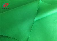China Waterproof Green Polyester Brushed Tricot Fabric Lining Fabric For Garment for sale