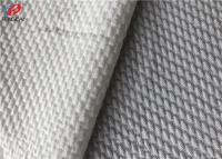 China Bullet Weft Knitted Jacquard Stretch Polyester Spandex Fabric for sale