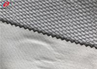 China Bullet Weft Knitted Jacquard Stretch Polyester Spandex Fabric for sale