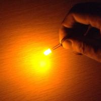 China 5mm LED Light Emitting Diode 600nm Orange Color 10000mcd Clear Lens Round Shape With Flange for sale