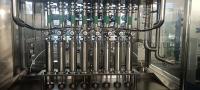 China 50-500ml Bottle Packing Machine Single Glass Bottle Alcohol Filling And Capping Machine for sale