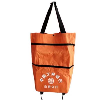 China Folding 600D Polyester Shopping Tote Bag with Wheels Expandable Size 50L for sale