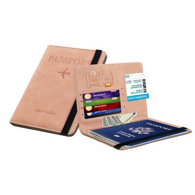 China RFID Passport Holder PU Leather Multi-Functional Travel Organizer with 12 Card Slots for sale
