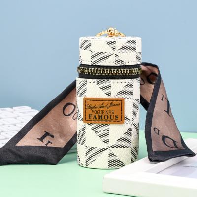 China Geometric Contrast Color Mini Keychain Coin Purse PU 5x5x10cm Earphone Bag for sale