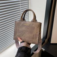 China Vintage Chic Textured Letter Tote Bag Women Large Capacity 32cm Fashion Handbag Wide Strap Shoulder Bag for sale