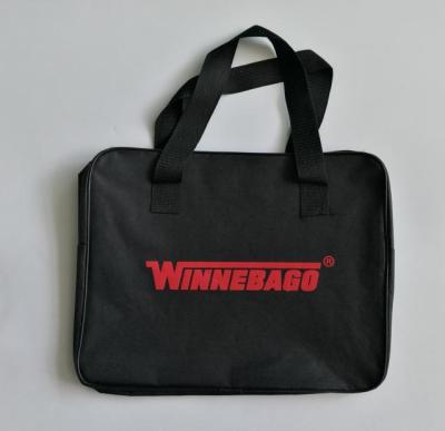 China Winnebago tote bag tool bag doucument bag  Designed with Rope Inspired Handles and Front Adjustable Straps Offering Large Secure Zip Pocket Key Hook and Topographic Lining for sale