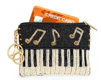 China Play it Again Coin Purse Eye catching butterfly coin bag with bold beadwork floral patterns playful tassel key ring and zipper closure perfect for small essentials for sale
