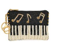 China Play it Again Coin Purse Eye catching butterfly coin bag with bold beadwork floral patterns playful tassel key ring and zipper closure perfect for small essentials for sale