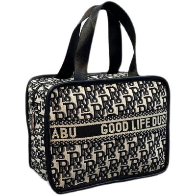 China Amazon Cotton Fabric With Lining 210D Makeup Storage Case For Travel for sale