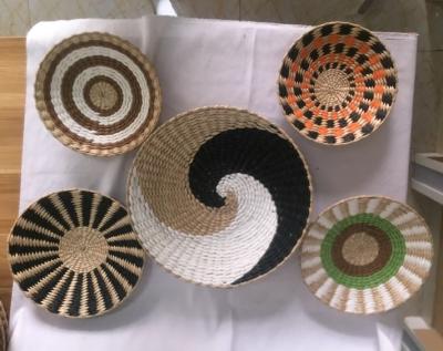 China Wholesale Natural Seagrass Wicker Wall Baskets Hanging Decor 30cm Diameter for sale