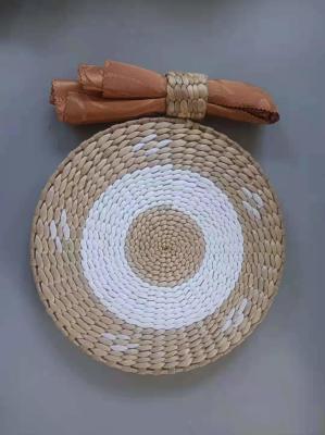 China Natural Water Hyacinth Woven Placemat 30cm Eco Friendly Handmade Seagrass Rattan Straw Table Mat for sale