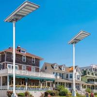 China Ip65 Automatic Solar Led Street Light Fixtures Dusk To Dawn Cool White Outdoor Waterproof for sale