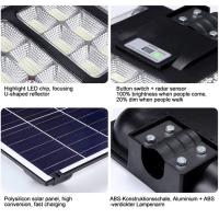 China 9-12m Installation Height Integrated Solar Street Light ABS Black Shell 100W 120LM/W IP65 Light for sale