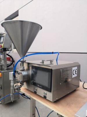 China 10 To 20BPM Tabletop Liquid Filling Machine With Hopper for sale