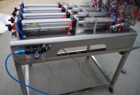 China PET Bottle Automated Bottle Filling Machine SS304 , 1L 4 Head Liquid Filling Machine for sale