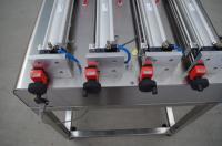 China 4 Heads SS304 Semi Automatic Bottle Filling Machine For Lube Oil Car Lotion for sale