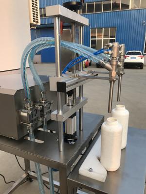 China 2 Head Tabletop Liquid Filling Machine for sale