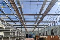 China Transparent Glass Greenhouse Customized Commercial Hydroponic Greenhouses With Motor Ventilation for sale