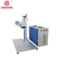 China 68 KG Weight Brass Metal Plastic Laser Engraving Marking Machine with EZCAD Control Software 0.015mm Working Accuracy for sale