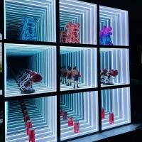 China Elevate Your Living Room with Fashionable Glass Door LED Infinity Mirror Wine Cabinet for sale
