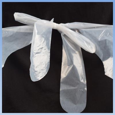 China Disposable PE Apron 71x116cm Oil Stain Resistant Waterproof Polyethylene Apron for sale