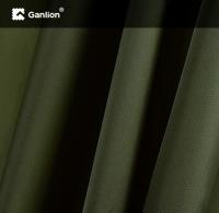 China Olive Green Polyester PBT Fabric Twill 2/1 Stretchable Pants Fabric for sale