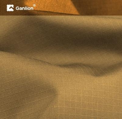 China Dark Khaki Polyester Cotton Recycled Fiber Fabric Ripstop 3*3 Ecofriendly for sale
