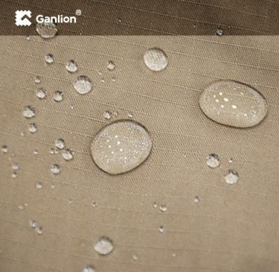 China Khaki Anti UV WR OR Water Repellent Fabric Ripstop 2*2 215GSM for sale