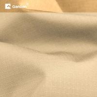 China Khaki Polyester Cotton Spandex Stretch Woven Teflon Fabric Ripstop 2*2 for sale
