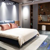 China Custom Modern Wardrobe with Vanity Table & Glass Door - 18mm Plywood Construction with Blum Soft Closing System for sale