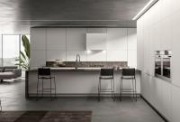 China Custom White L-Shaped Melamine Kitchen Cabinets 24-36 Inch with Push-to-Open Mechanisms for Small Spaces for sale