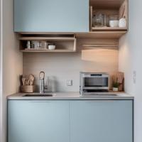 China Compact Hotel Kitchenette Unit with 18mm Cabinet Construction & Integrated Appliances for Guest Rooms & Apartments for sale
