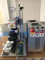 China Portable 20w 30w 50w 100w CO2 Laser Marking Machine Fiber Laser Engraving Machine for Wood for sale