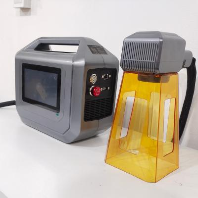 China Small Handheld Expire Date logo Coding 20w 30w Portable Fiber Laser Marking Machine for Metal Plastic Glass Cable Wire Tube for sale