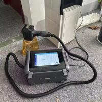 China Small Handheld Expire Date logo Coding 20w 30w Portable Fiber Laser Marking Machine for Metal Plastic Glass Cable Wire Tube for sale