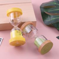 China Home Decor Resin Yoga Hourglass Shaped Fruit Mini Hourglass Timer for sale