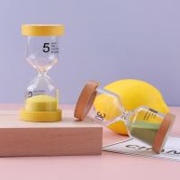 China Home Decor Resin Yoga Hourglass Shaped Fruit Mini Hourglass Timer for sale