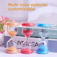 China Colorful Plastic Sand Timer Clock 2 3 5 10 15 30 Min Kids Game Hourglass for sale