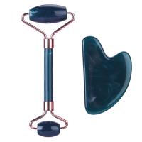China Fashionable Skincare Face Jade Roller pink Quartz Stone Face Roller for sale
