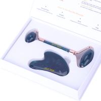 China Fashionable Skincare Face Jade Roller pink Quartz Stone Face Roller for sale