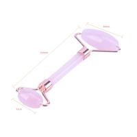 China Fashionable Skincare Face Jade Roller pink Quartz Stone Face Roller for sale