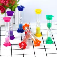 China Colorful Plastic Hourglass Timer Flower Shape Base Sand Timer For Kids Education for sale