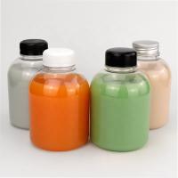 China Airtight Screen Printing Plastic Beverage Bottles 400ml With Lid Caps for sale