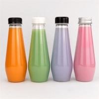 China Degradable Disposable Plastic Juice Bottles Empty Juice Bottles With Caps 350ml for sale
