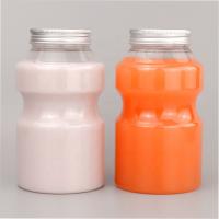 China 500ml Plastic PET Bottles Unique Shape Fruit Juice Bottles OEM With Lid for sale