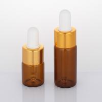 China Frosted 5ml 10ml Empty Cosmetic Bottle Amber Dropper Round Face Serum Bottle for sale