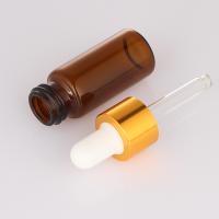 China Frosted 5ml 10ml Empty Cosmetic Bottle Amber Dropper Round Face Serum Bottle for sale